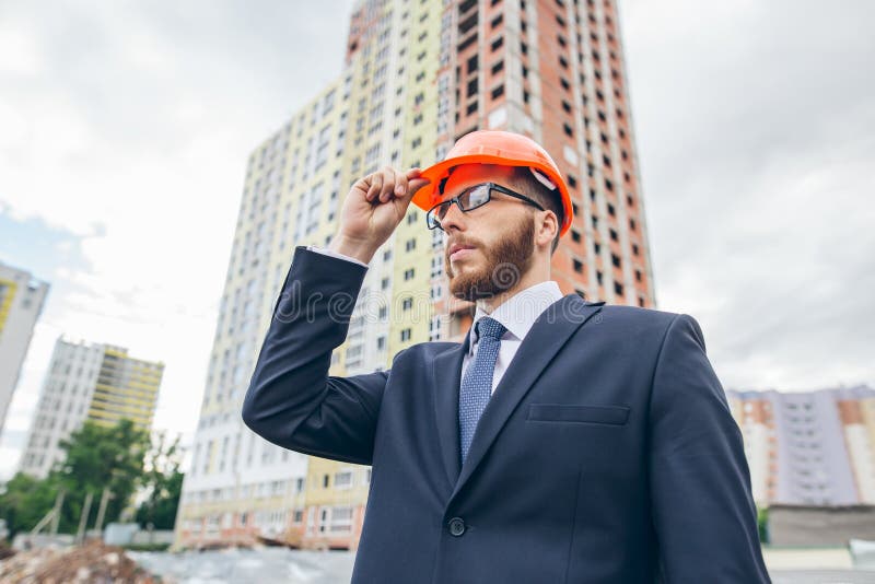 Engineer Builder Wearing Suit and Helmet at Construction Site Stock ...