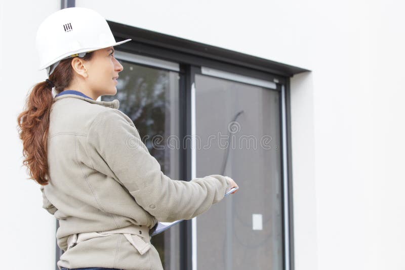 Engineer Builder Woman in Uniform Holds Paper Stock Photo - Image of ...