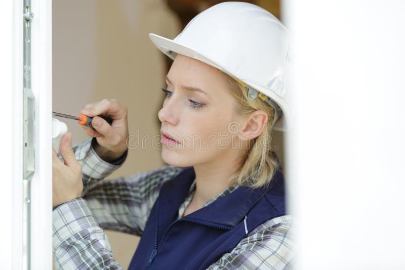 Engineer Builder Woman Working on Window Stock Image - Image of laborer ...