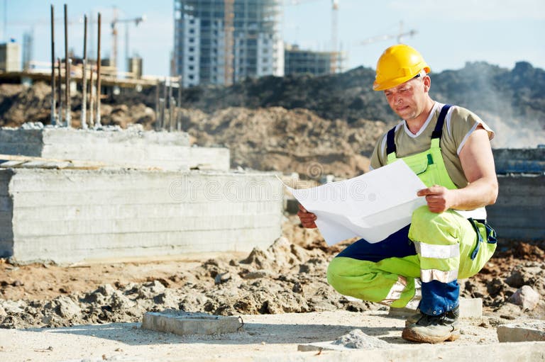 Engineer Builders at Construction Site with Draft Stock Image - Image ...