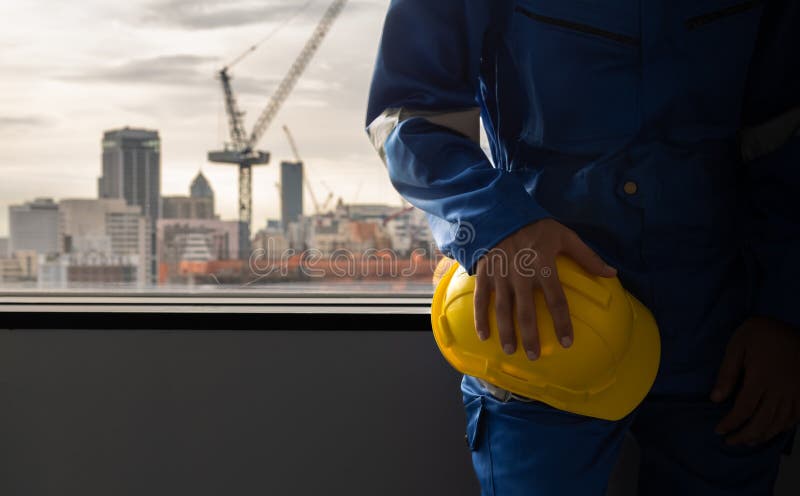 Engineer at Building Construction Site, Safety First Equipment Stock ...