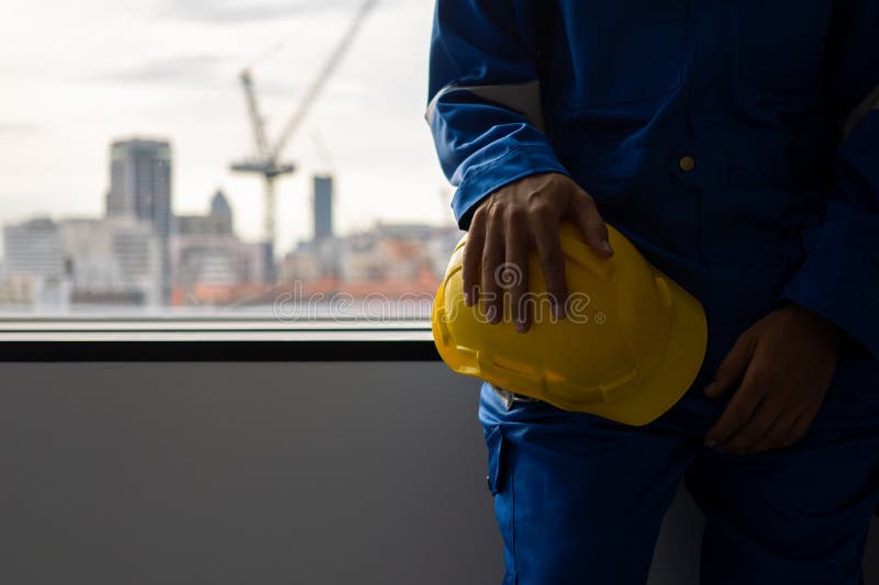 Engineer at Building Construction Site, Safety First Equipment Stock ...