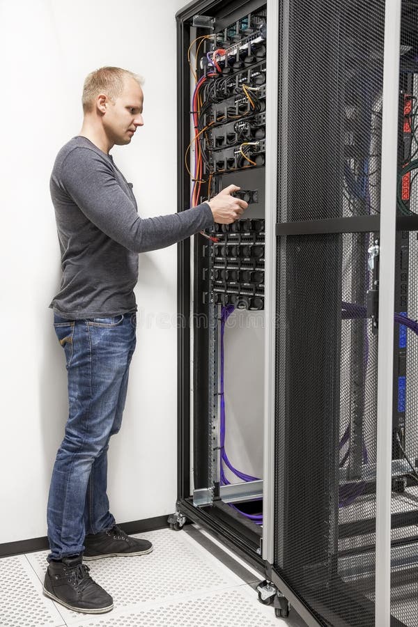 It Engineer Building Network Rack in Datacenter Stock Photo - Image of ...