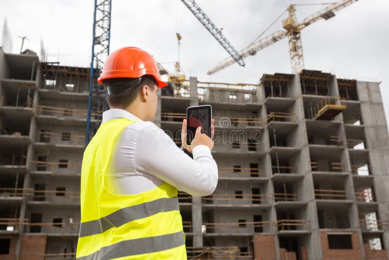 Engineer on Building Site with Digital Tablet Stock Image - Image of ...