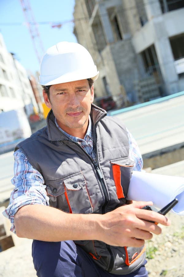 Engineer on Building Site Working Stock Photo - Image of site, building ...