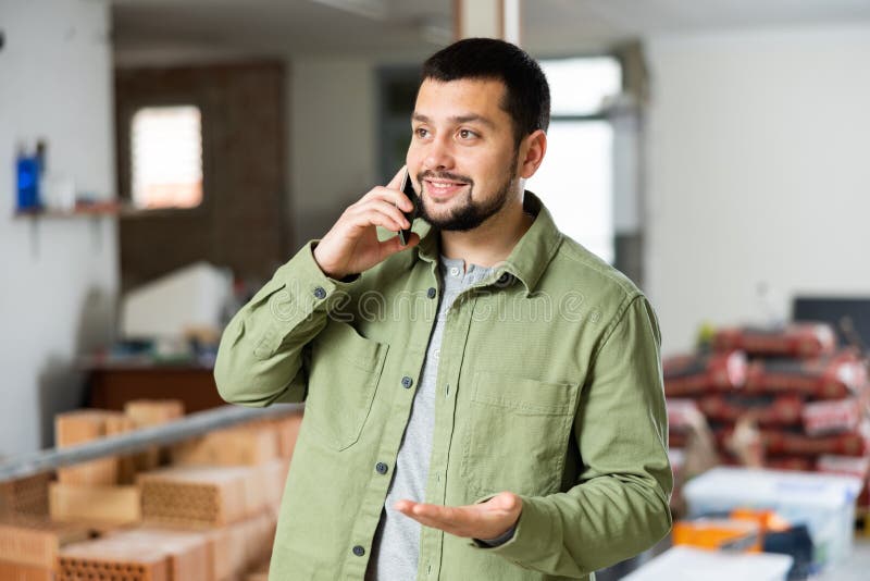 Engineer of Building Under Construction Discussing Repair Plan on ...