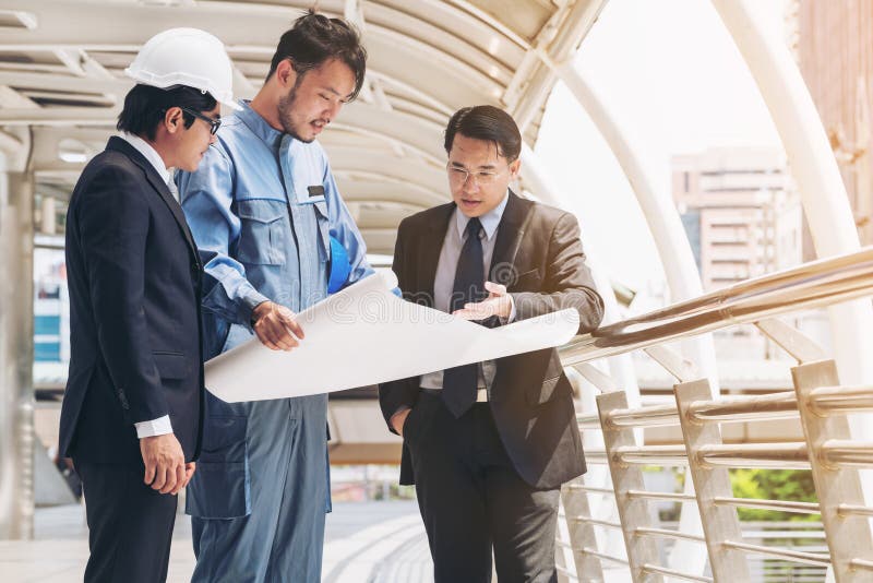 Engineer and Business Man Discuss about Blueprint Stock Image - Image ...