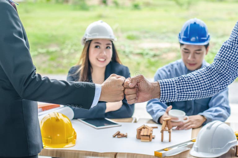 Engineer and Businessman Handshake, Teamwork between Professional ...