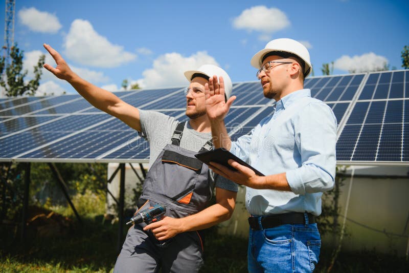 Engineer and Businessman Planing New Ecology Project. Around Solar ...