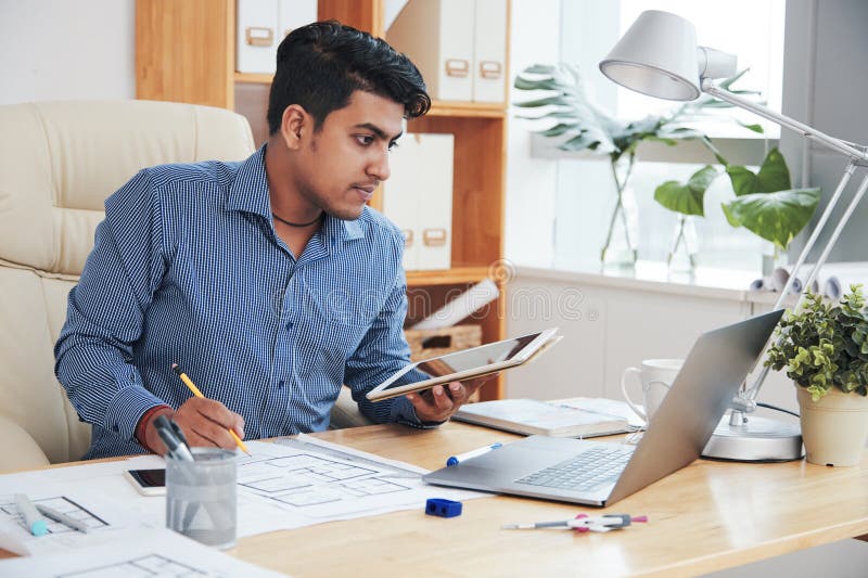 Engineer busy with work stock photo. Image of asian - 124391432