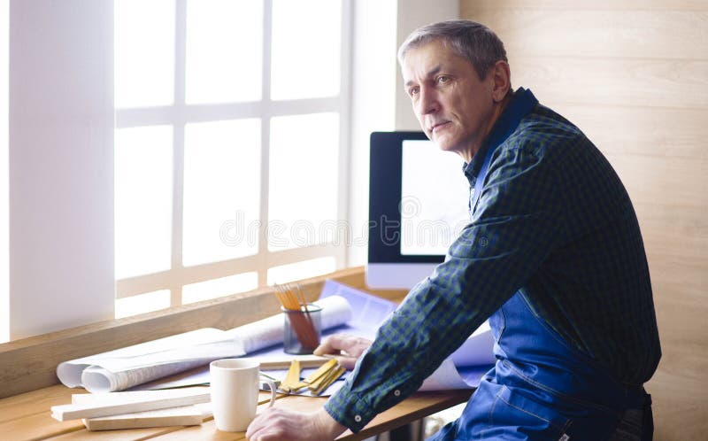 Engineer Carpenter Working on Laptop and Sketching Project Stock Photo ...