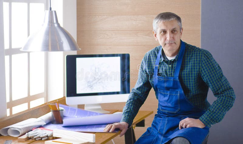 Engineer Carpenter Working on Laptop and Sketching Project Stock Image ...