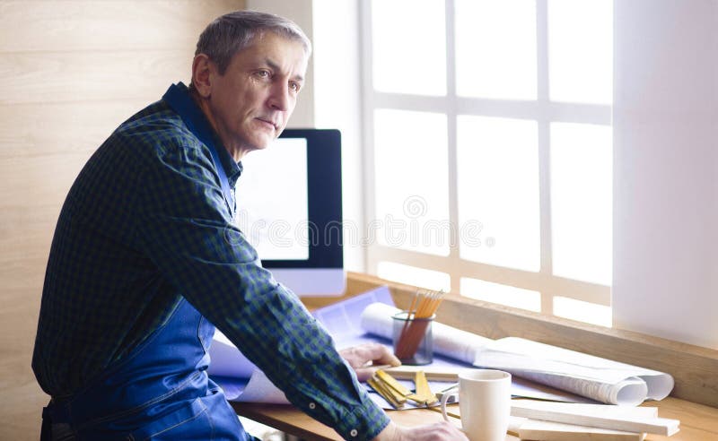 Engineer Carpenter Working on Laptop and Sketching Project Stock Photo ...