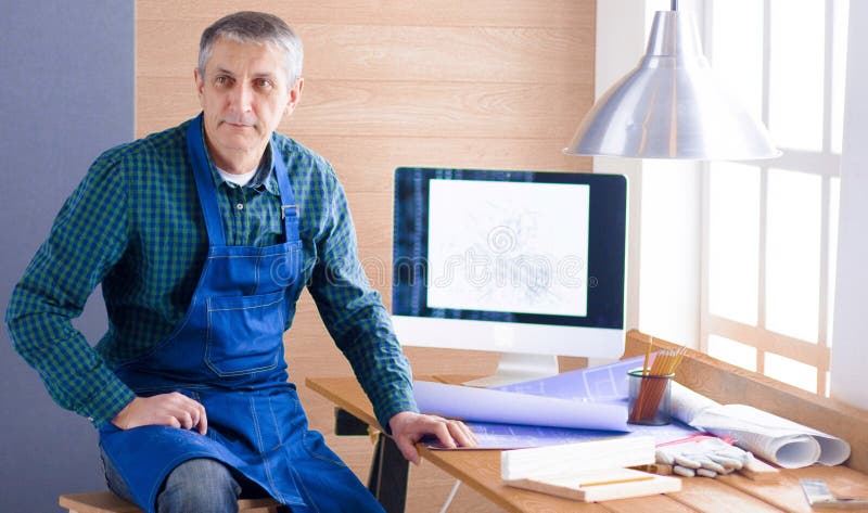Engineer Carpenter Working on Laptop and Sketching Project Stock Photo ...