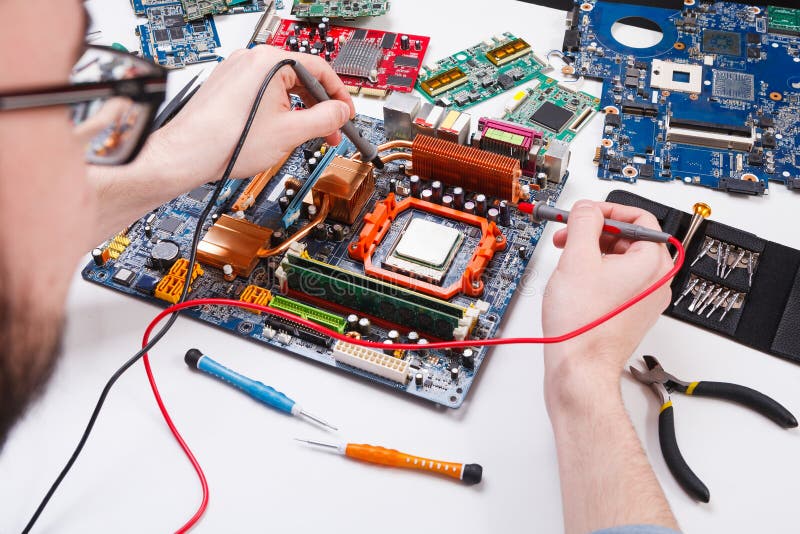 Engineer Checking Motherboard with Multimeter Stock Photo - Image of ...
