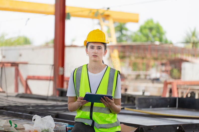 Senior Engineer and Female Foreman Team Checking Project at Precast ...
