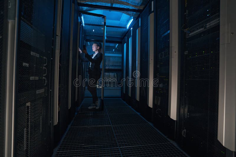 Engineer Businesswoman Works in Network Server Room Stock Image - Image ...
