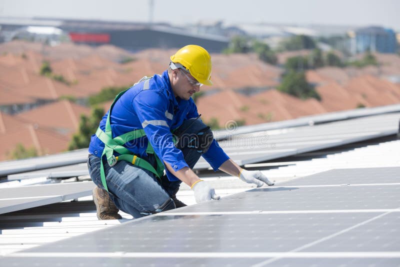 Engineer Checking on Solar Panel on the Factory Rooftop Stock Photo ...