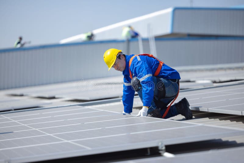 Engineer Checking on Solar Panel on the Factory Rooftop Stock Image ...
