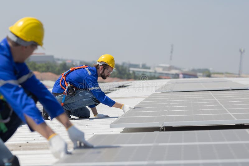 Engineer Checking on Solar Panel on the Factory Rooftop Stock Image ...