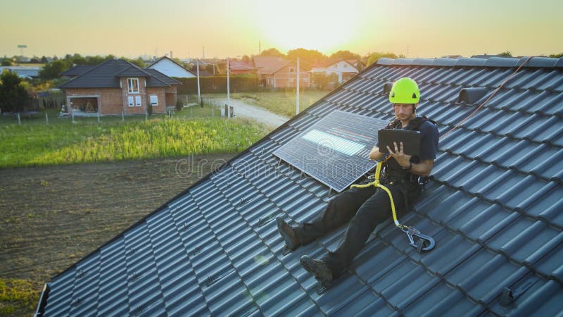Engineer Checking Solar Panel Installation Using Tablet with Digital ...