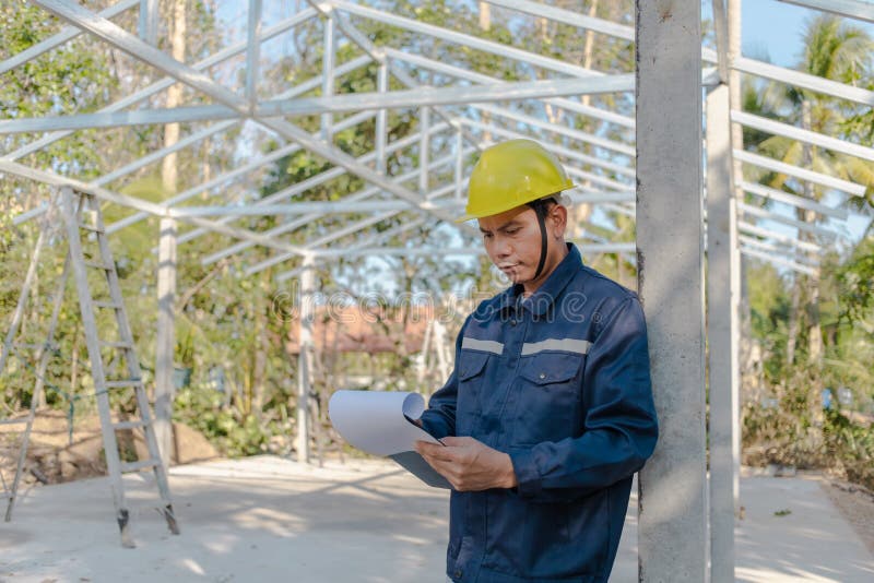 Engineer Checking Work at Construction Building. Stock Photo - Image of ...