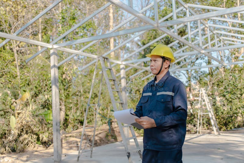 Engineer Checking Work at Construction Building. Stock Photo - Image of ...