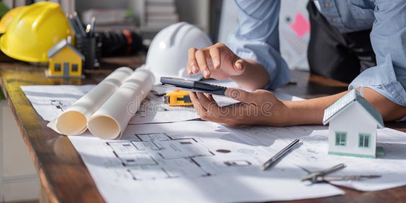 Engineer Checks Construction Blueprints on New Project with Engineering ...