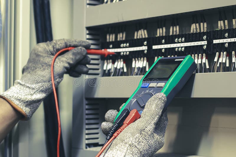 Engineer Checks the Operation of Electrical Control Equipment Stock ...