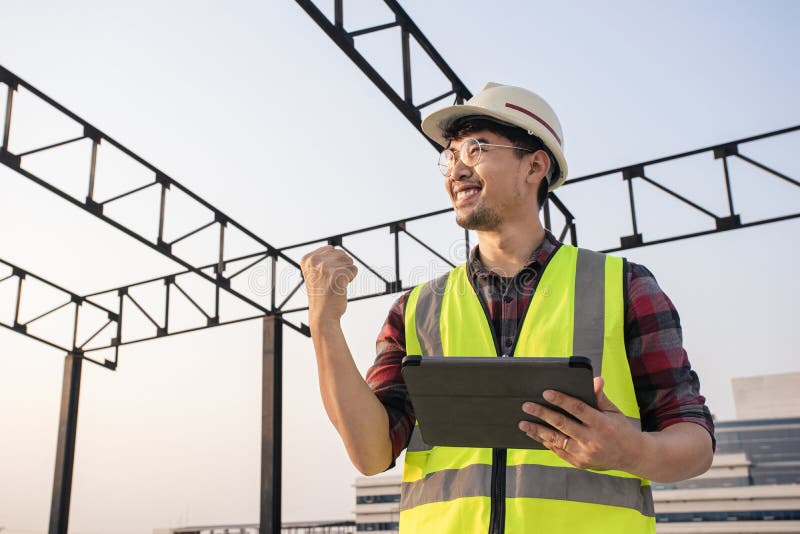 Engineer Cheerfull Use Tablet for Working in Construction Site Work ...