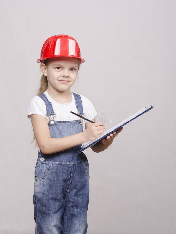 Engineer Child Stands Helmet Writes Folder Stock Photos - Free ...