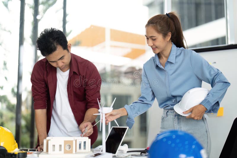 Engineer Collaboration on Sustainable Project. Team Discussing ...