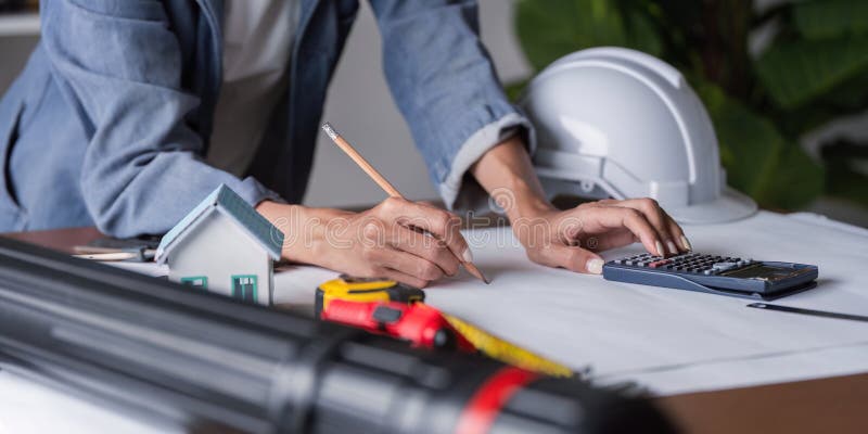 Engineer Conducting Measurements for Structural Design and Execution ...