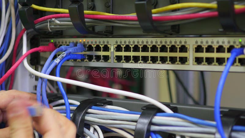 It Engineer Patching Network Equipment in Server Room. Network Engineer ...
