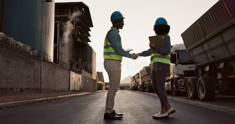 Engineer, Construction and Hand Shake at Site for Welcome, Greeting or ...