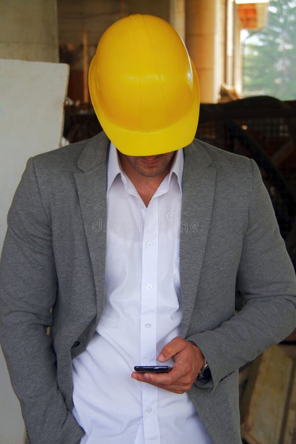 Engineer at a Construction Site Making a Business Call Stock Photo ...