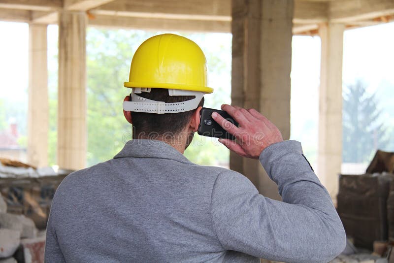 Engineer at a Construction Site Making a Business Call Stock Image ...