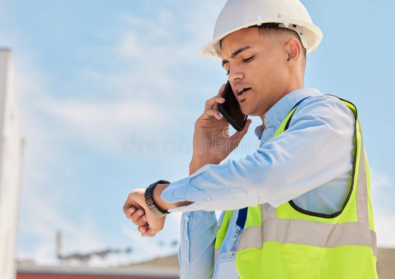 Engineer on Construction Site, Phone Call and Checking Time for ...