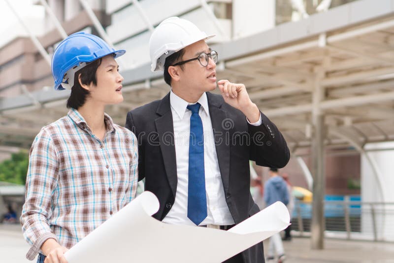 Group of Happy Builder Construction People Talking and Planning Work ...