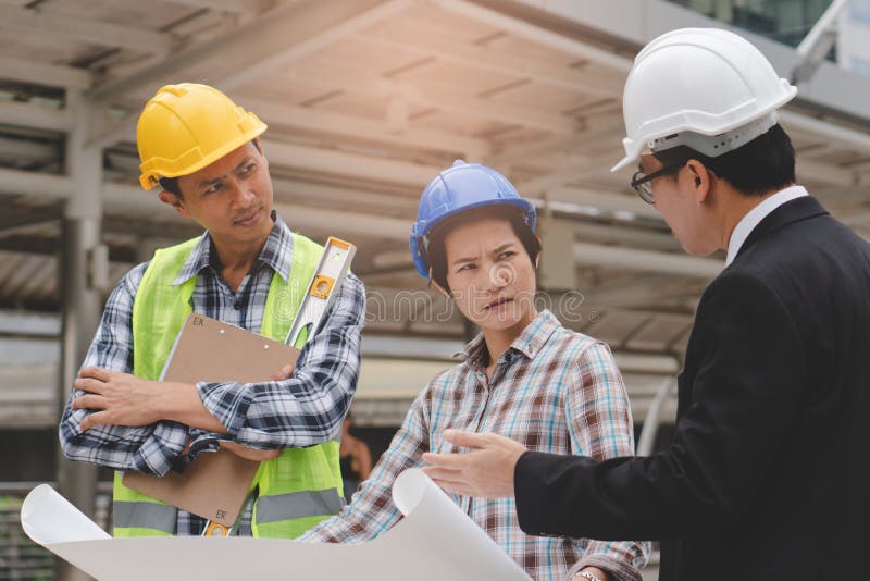 Group of Happy Builder Construction People Talking and Planning Work ...