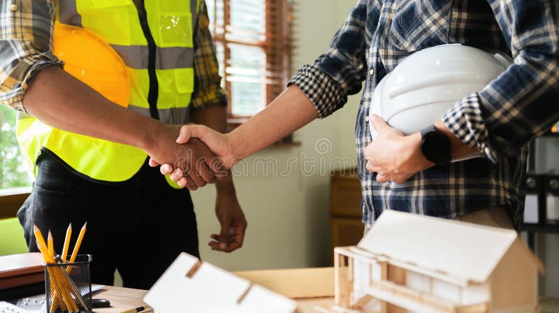 Engineer and Contractor Join Hands after Signing Contract,they are ...