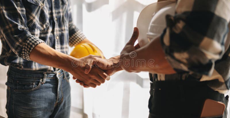 Engineer and Contractor Join Hands after Signing Contract,they are ...