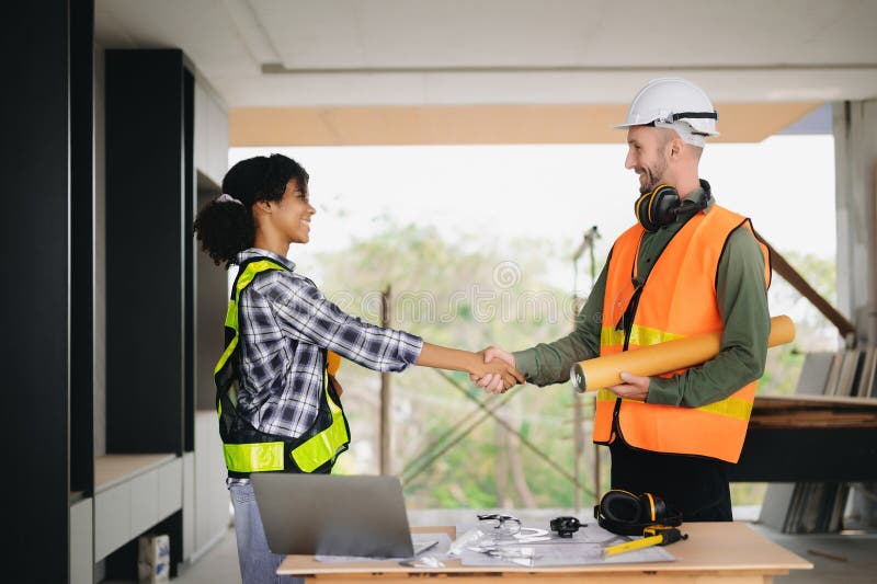 Engineer and Contractor Join Hands after Signing Contract,they are ...