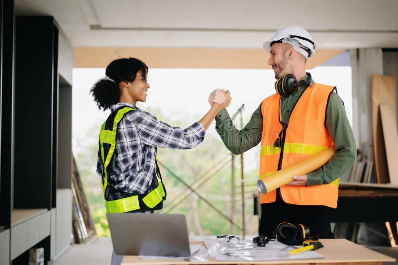 Engineer and Contractor Join Hands after Signing Contract,they are ...