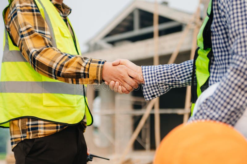 Engineer and Contractor Join Hands after Signing Contract,they are ...