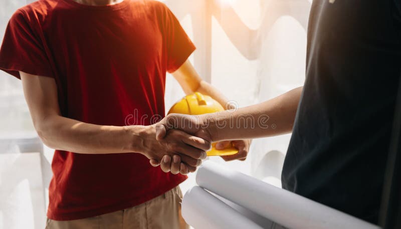 Engineer and Contractor Join Hands after Signing Contract,they are ...