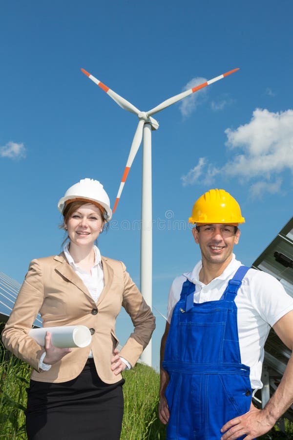 Engineer and Contractor Posing in Front of Wind Turbine Stock Image ...
