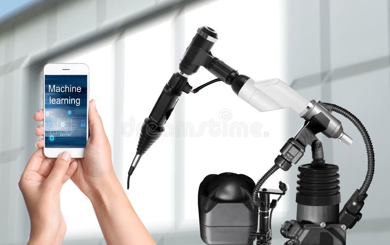 Engineer Controlling Electronic Laboratory Robot Manipulator with ...