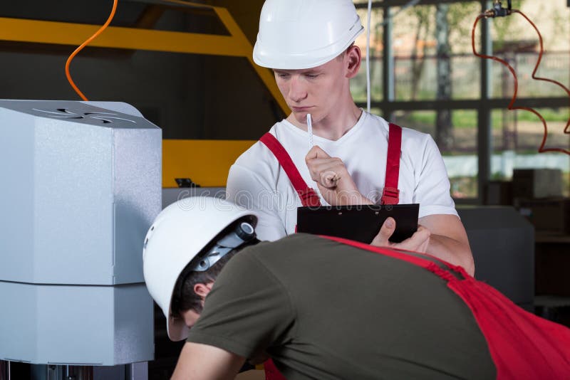 Inspector Controlling Safety during Work at Factory Stock Image - Image ... Inspector Controlling Safety during Work at Factory Stock Image - Image ...