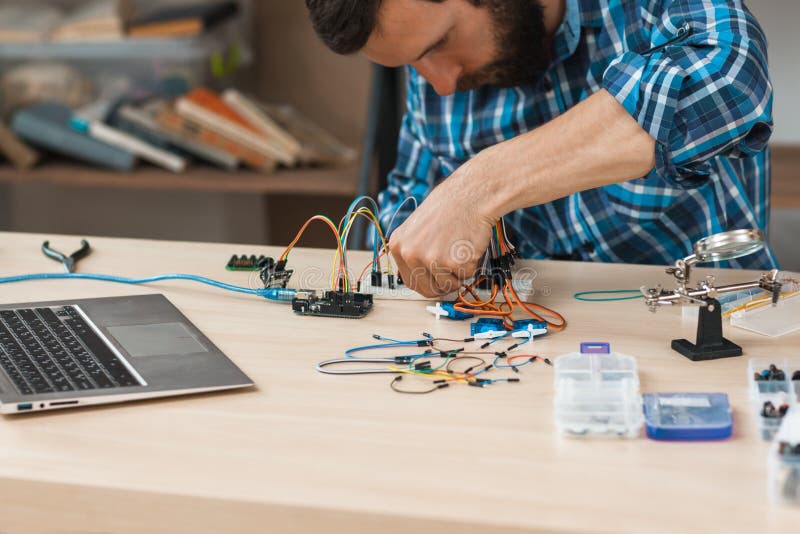 Engineer Creating Electronic Construction at Lab Stock Photo - Image of hands, electrician: 79716264